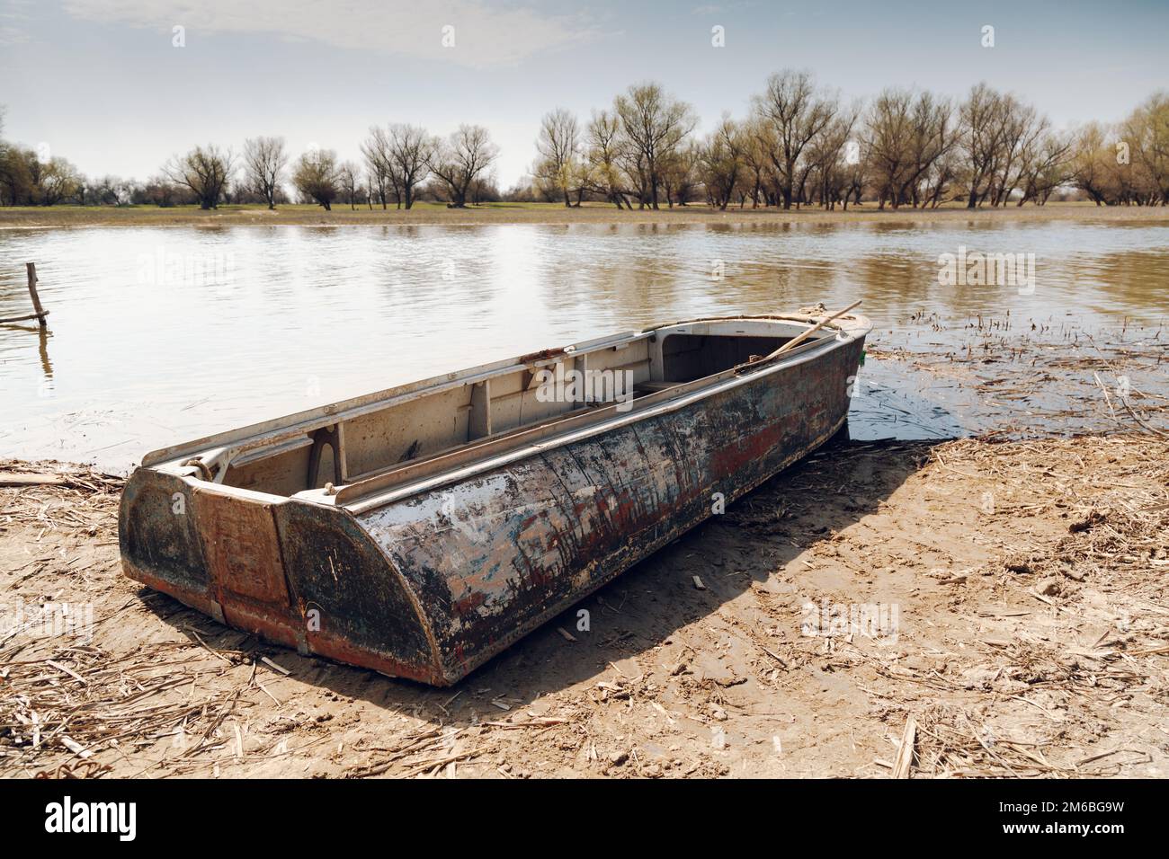 Boat at the riverside Stock Photo - Alamy