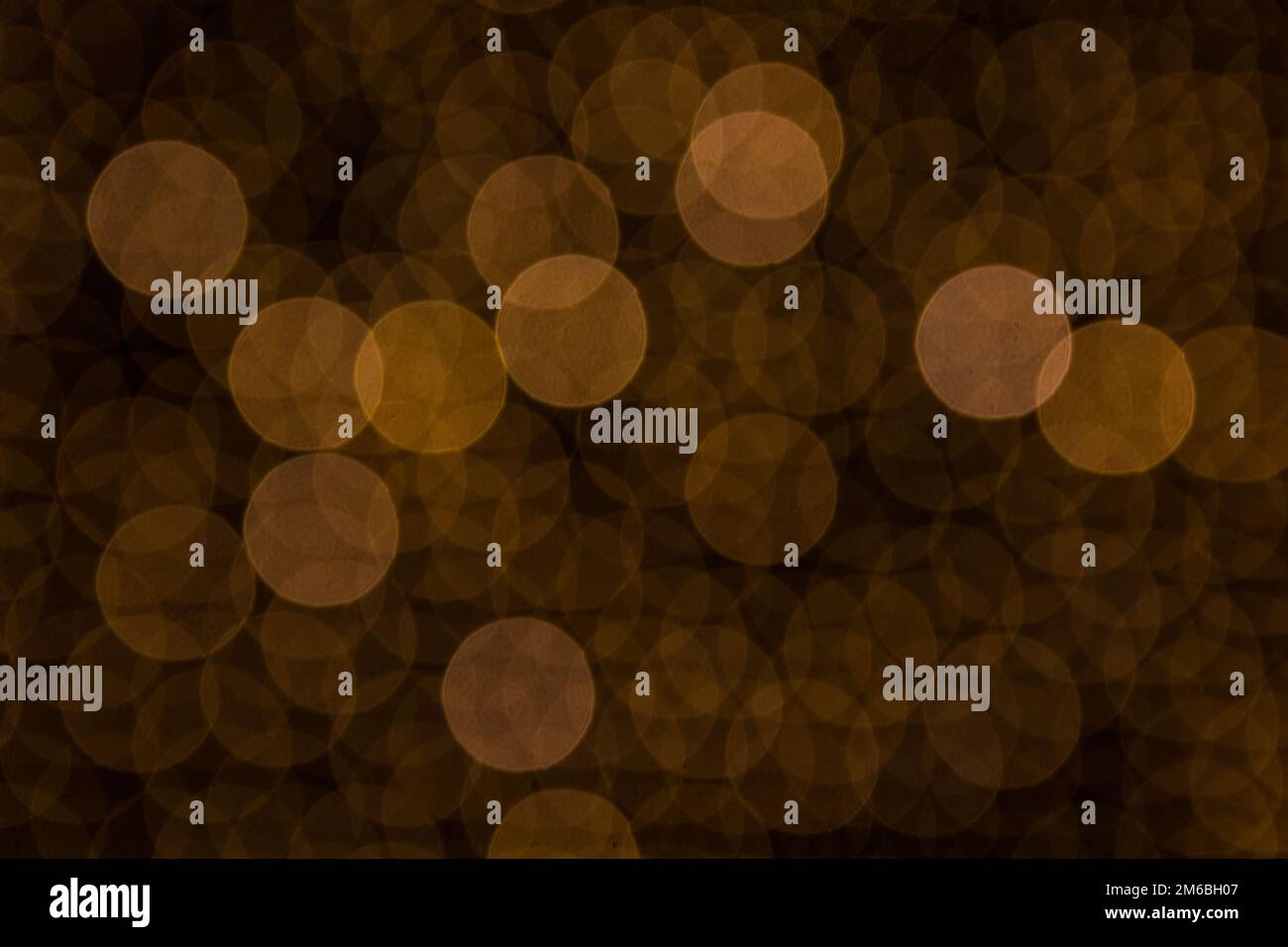 Large twinkle light defocused with many christmas light soft warm ...