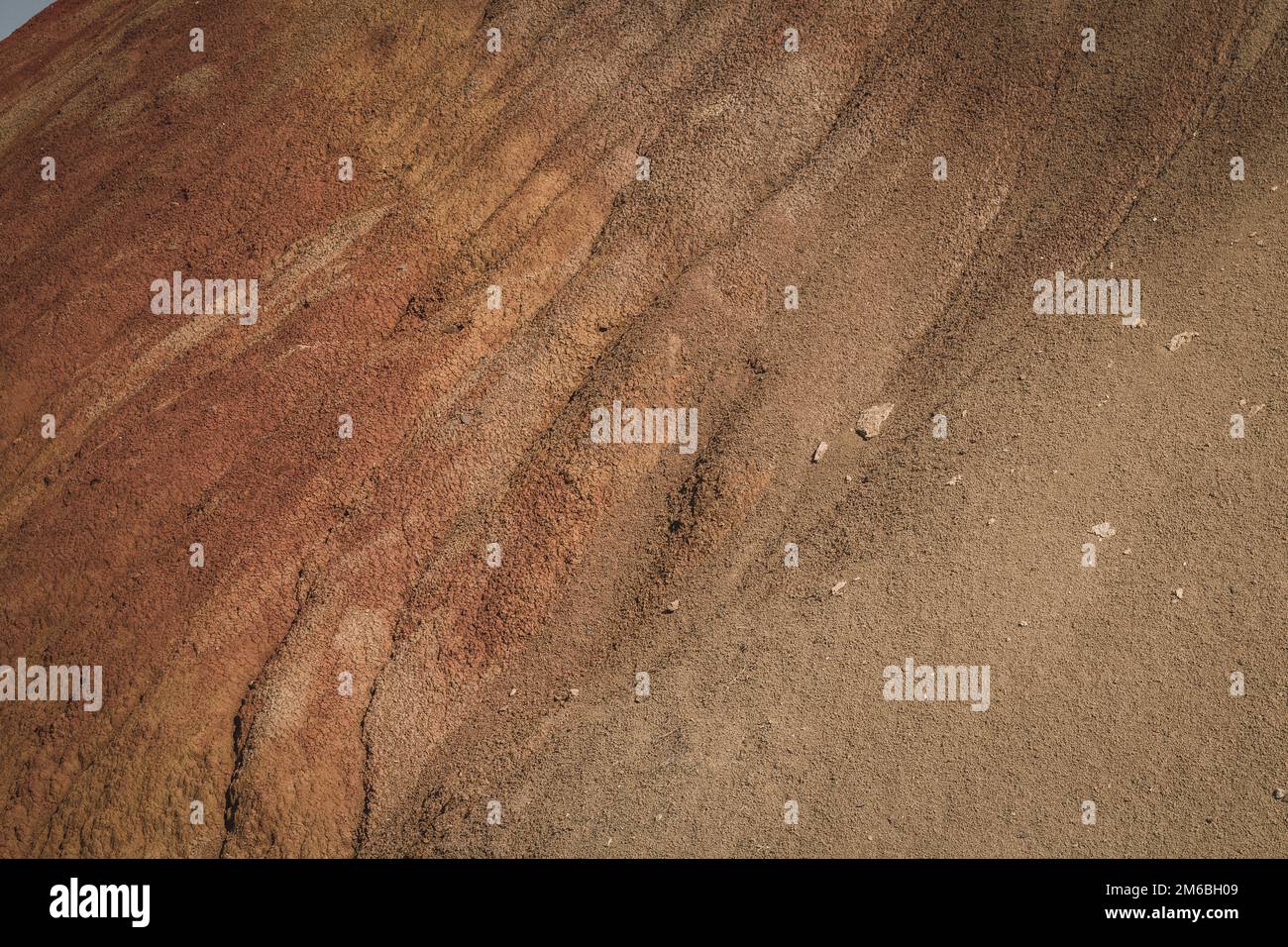 Incredible wavy diagonal patterned textured sand waves on a desert hill ...