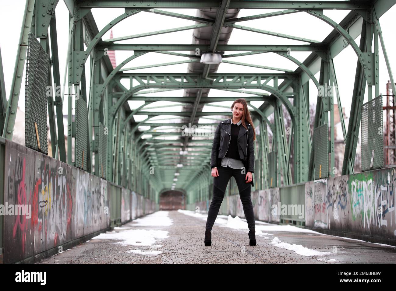 Beautiful girl in black leather jacket in winter time Stock Photo - Alamy