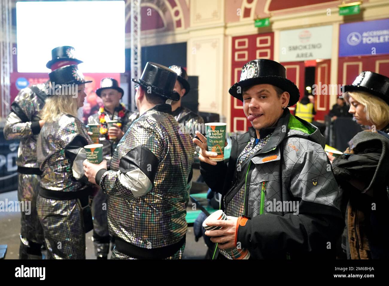 Fans in fancy dress ahead of the final of the Cazoo World Darts ...