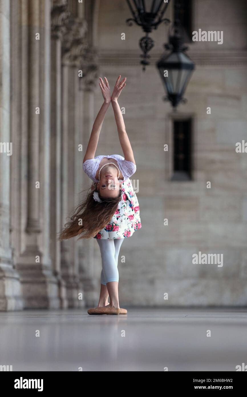 Graceful ballerina dancing the pose combre in a palace Stock Photo - Alamy