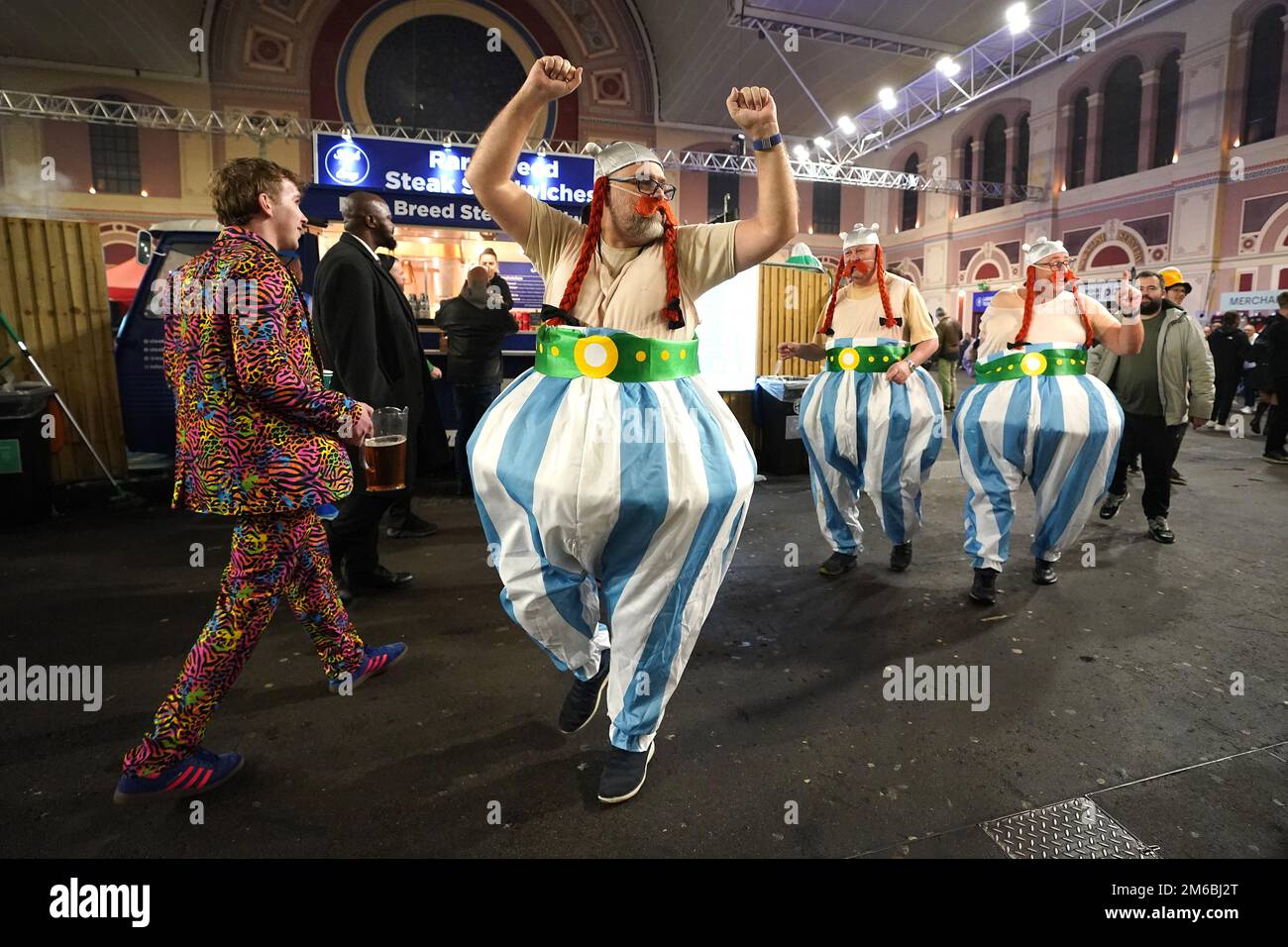 Fans in fancy dress ahead of the final of the Cazoo World Darts ...