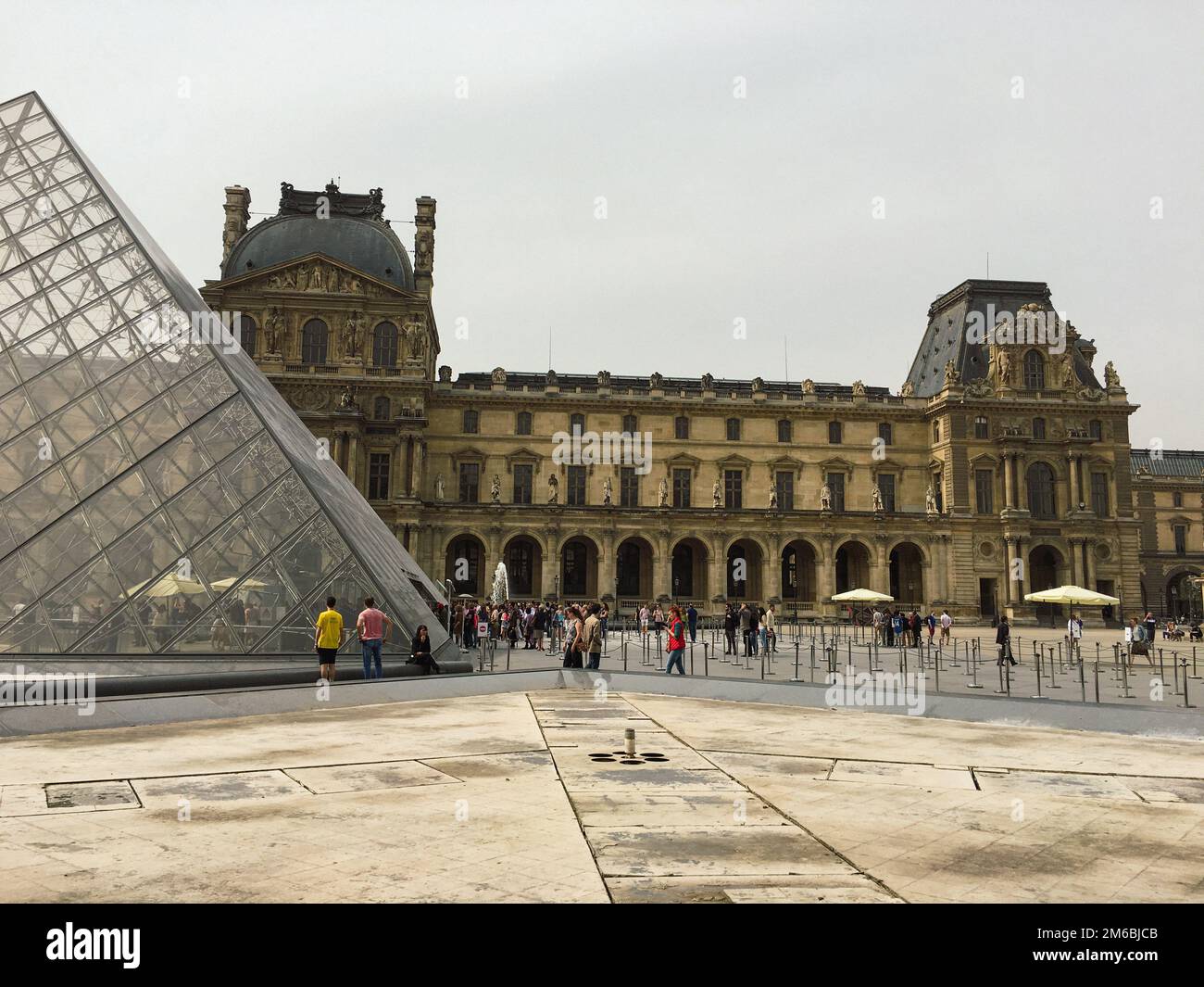 The Louvre Museum with the The Louvre Colonnade in the background at ...