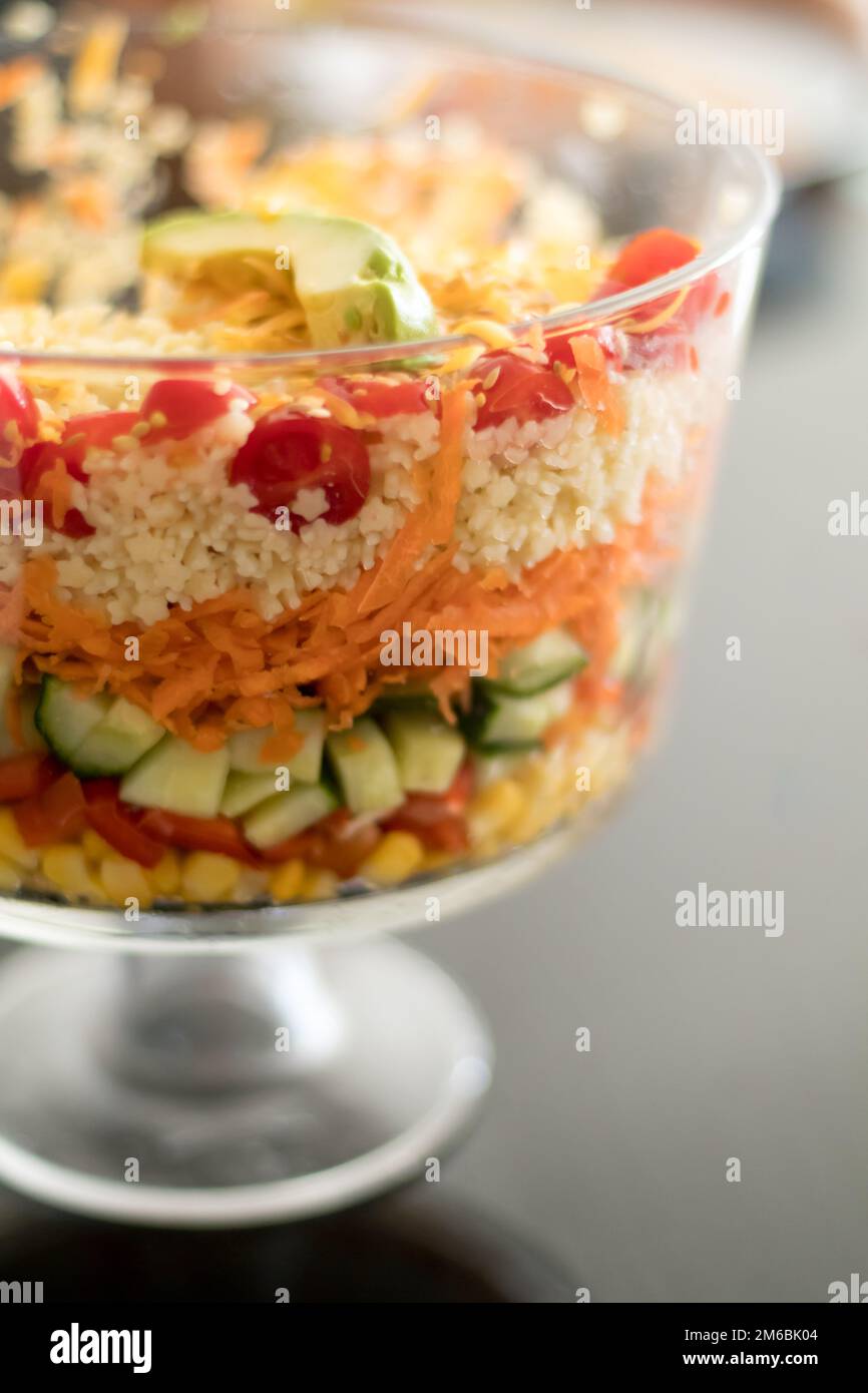 Pretty Colorful Layered Salad in a Glass Trifle Bowl Stock Photo - Alamy
