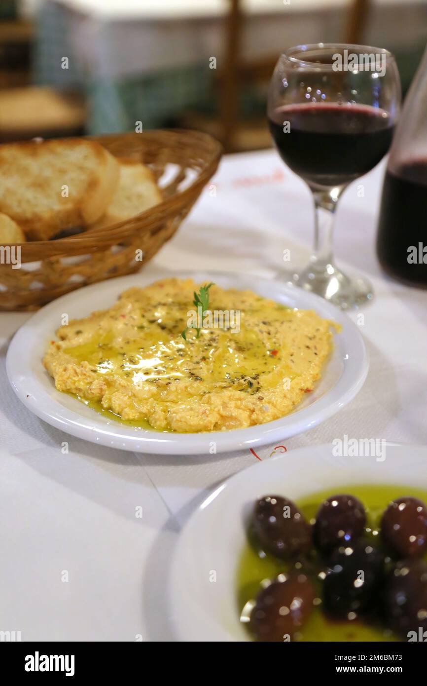 Greek dish of mushed salty cheese and spices Stock Photo - Alamy