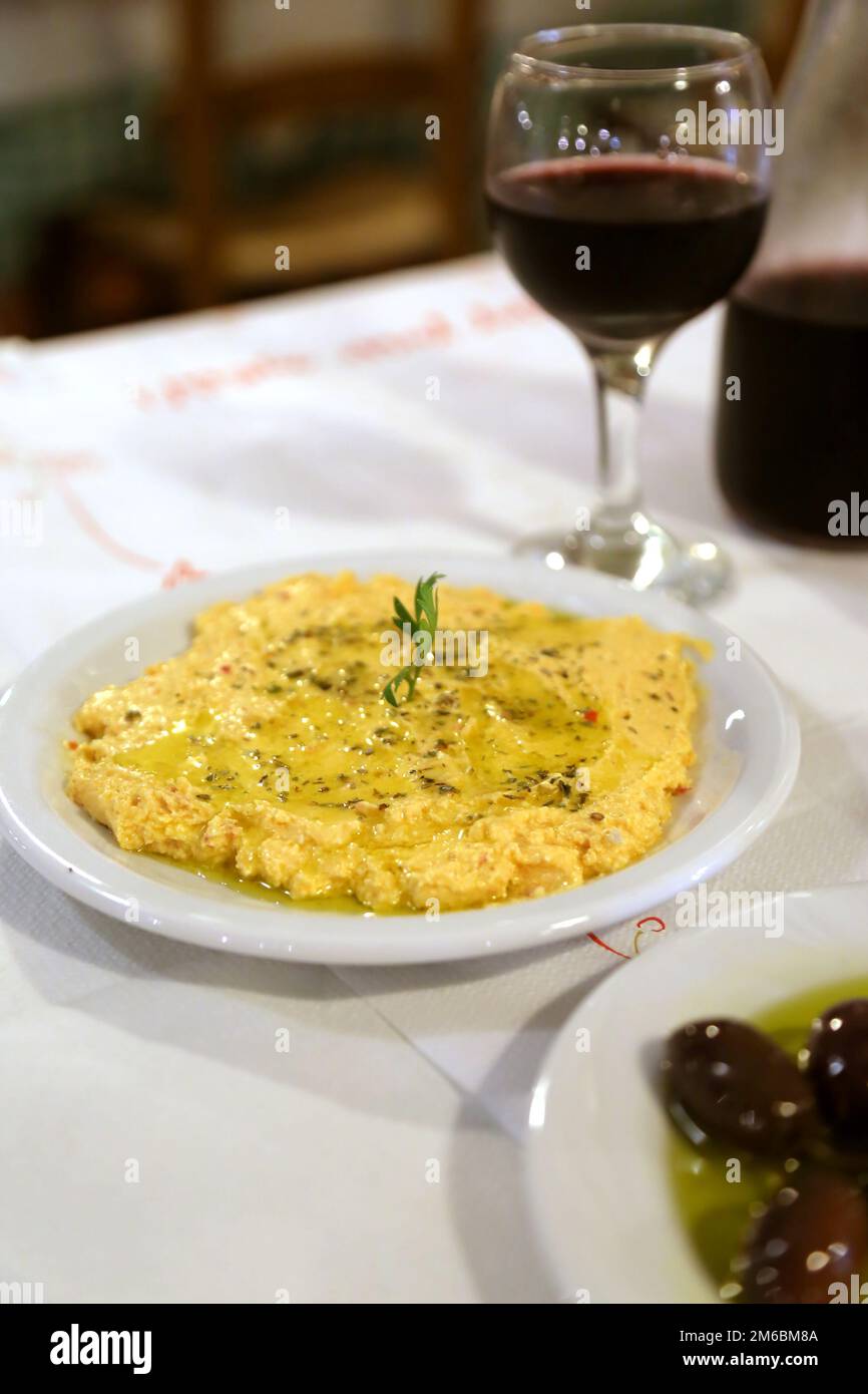 Greek dish of mushed salty cheese and spices Stock Photo - Alamy