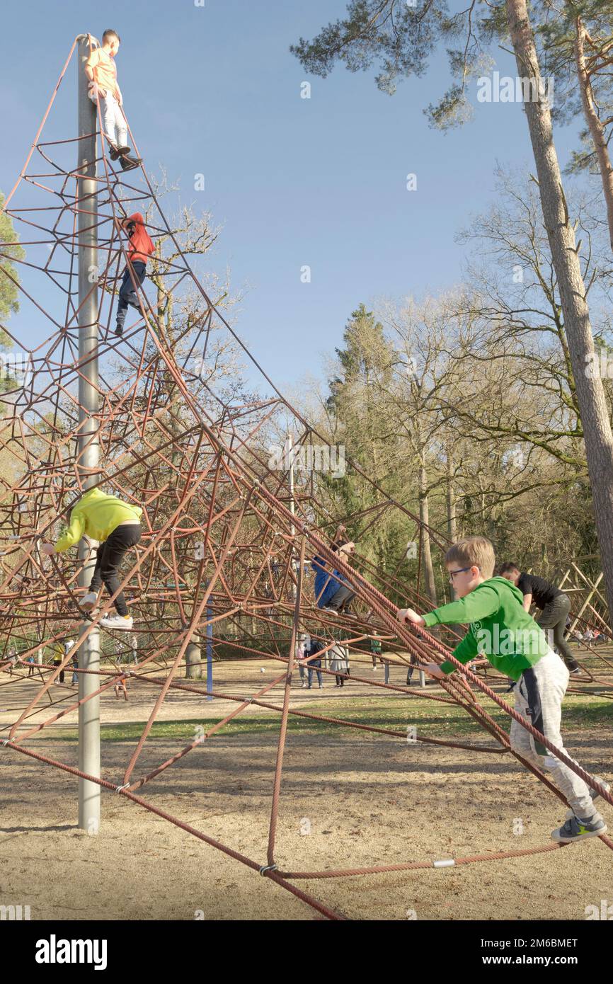 Park children playing modern equipment hi-res stock photography and ...