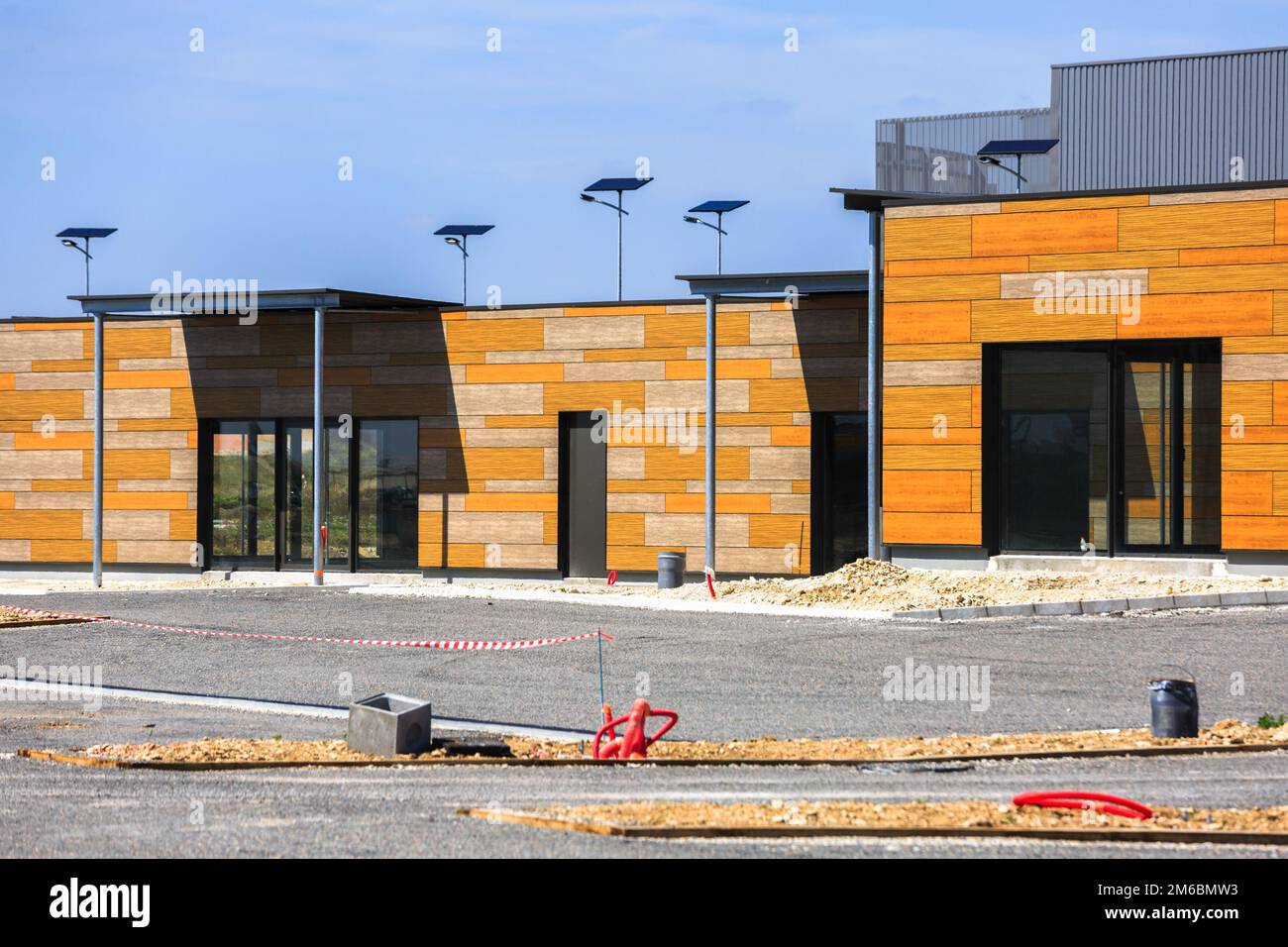 Newly constructed woodem block buildings in an industrial area Stock ...