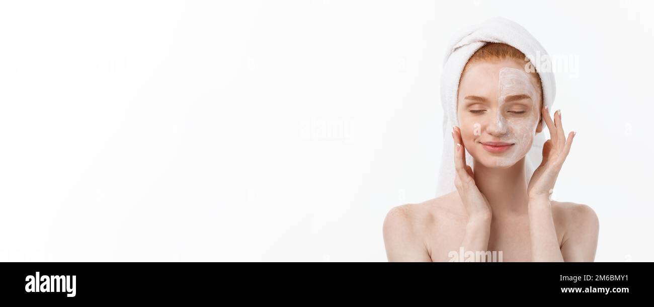 beautiful model applying cosmetic cream treatment on her face on white Stock Photo - Alamy