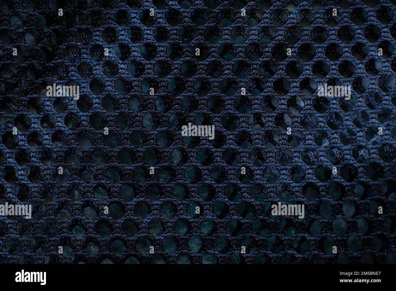mesh dark fabric as background Stock Photo - Alamy