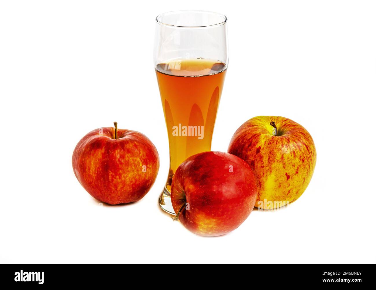 Three ripe apples and glass of apple juice on a white background Stock ...