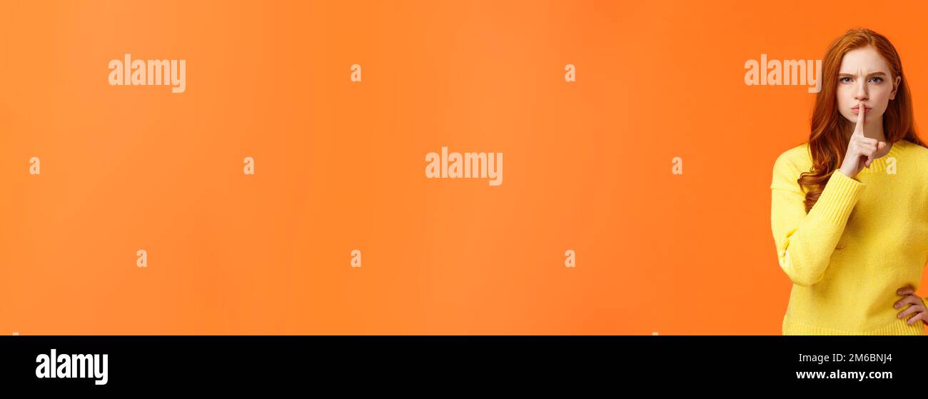 Silence shush shushing finger on mouth hi-res stock photography and ...