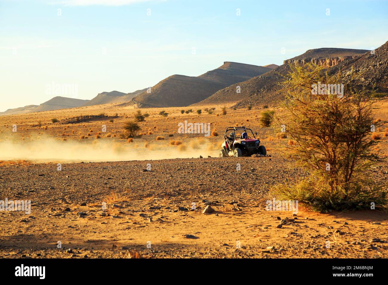 Off road car with it's pilot in Morocco Stock Photo - Alamy