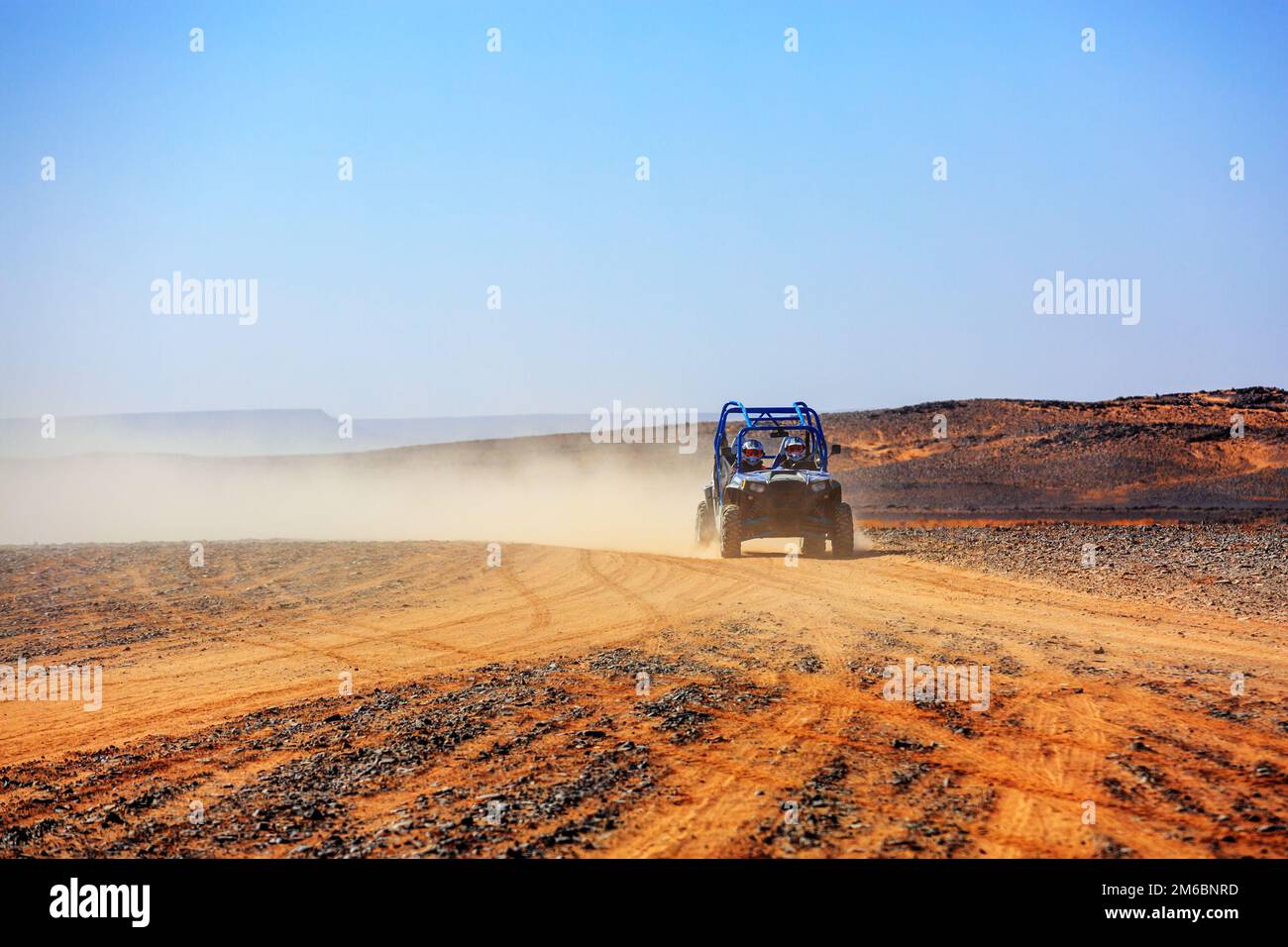 Off road car with it's pilot in Morocco Stock Photo - Alamy