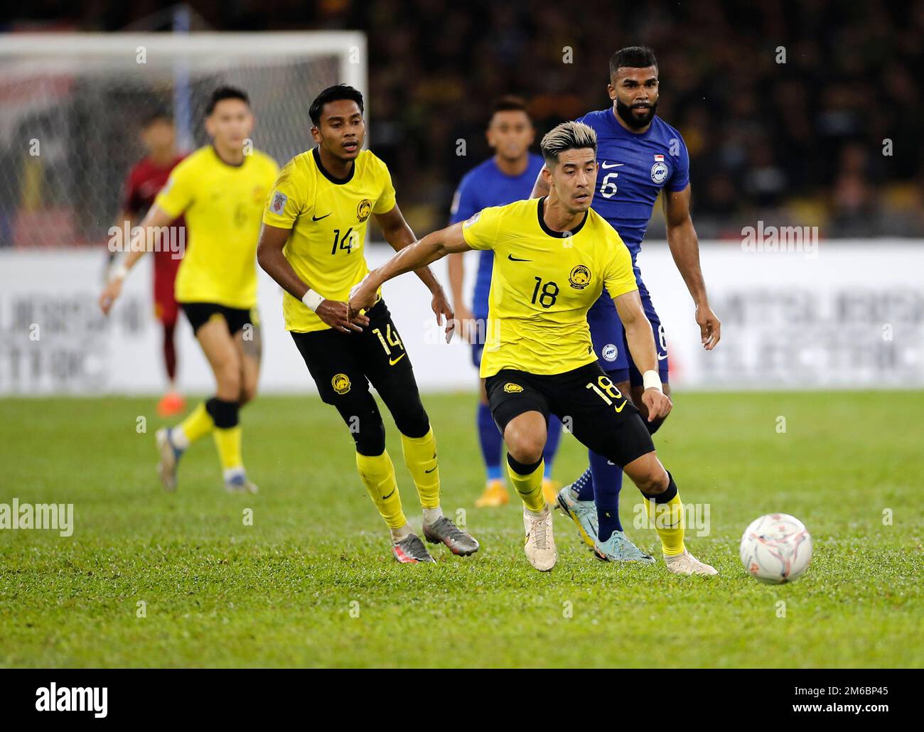 Brendan Seng Ling Gan of Malaysia (C) and Anumanthan Kumar of Singapore ...