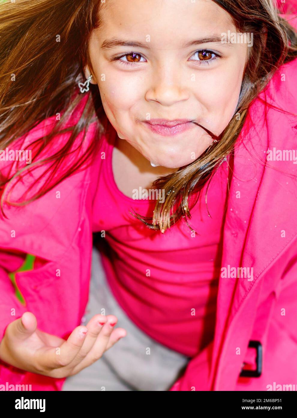 Cute kid about to drink water Stock Photo - Alamy