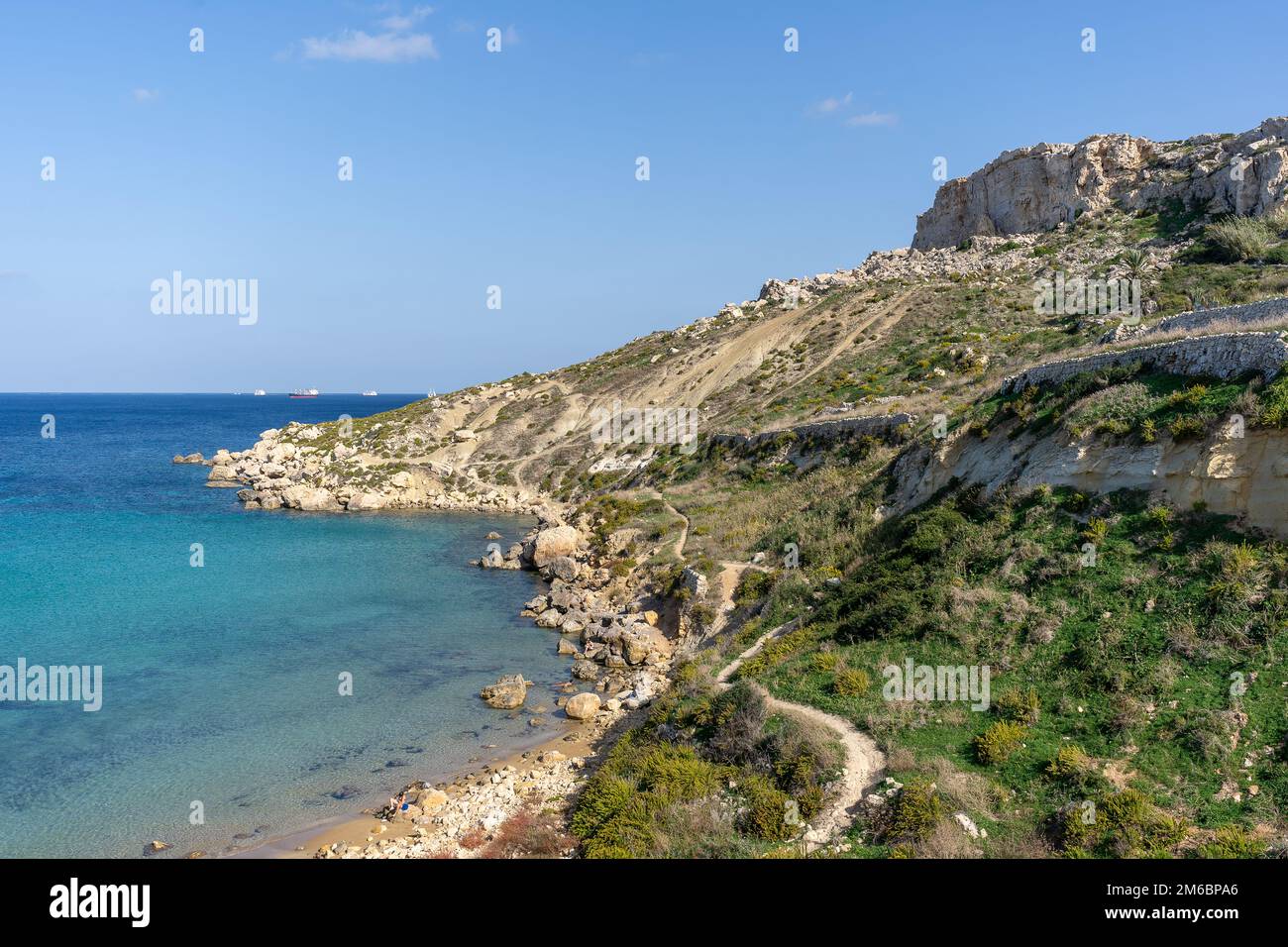 Hiking along beautiful Maltese countryside and coastline above Selmun ...