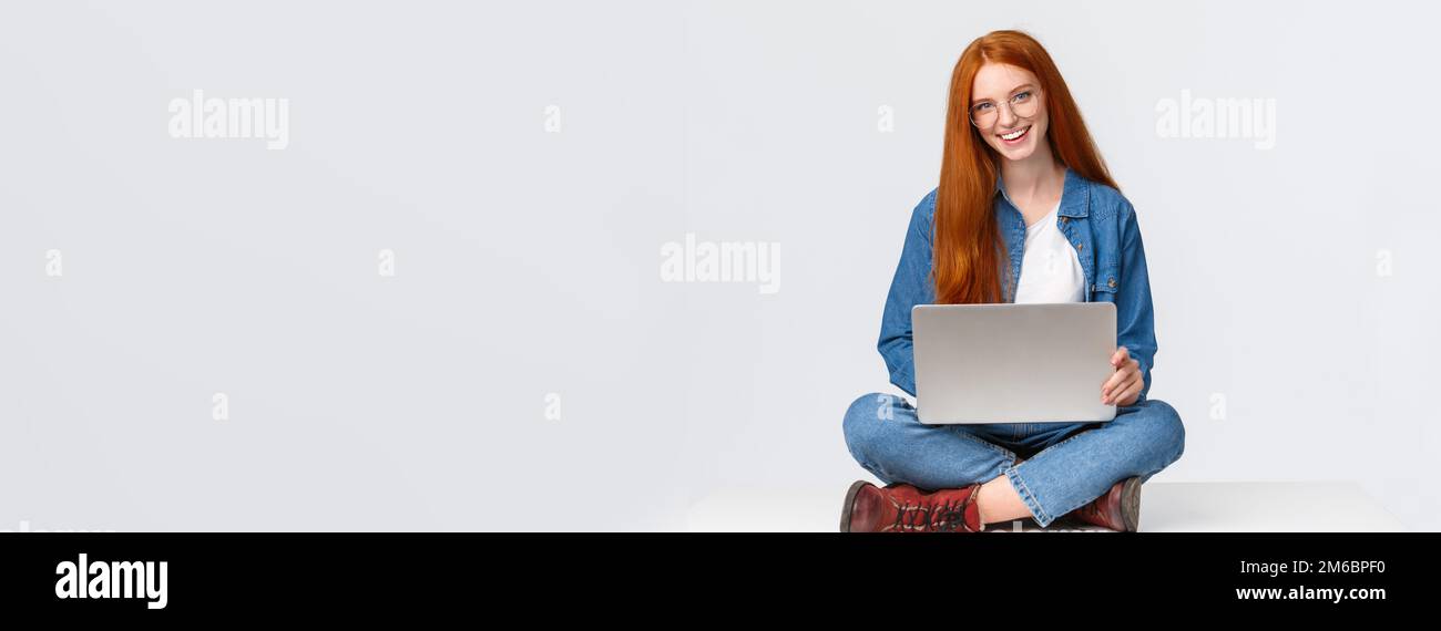 Cheerful sassy redhead female student, college girl in glasses, sitting ...