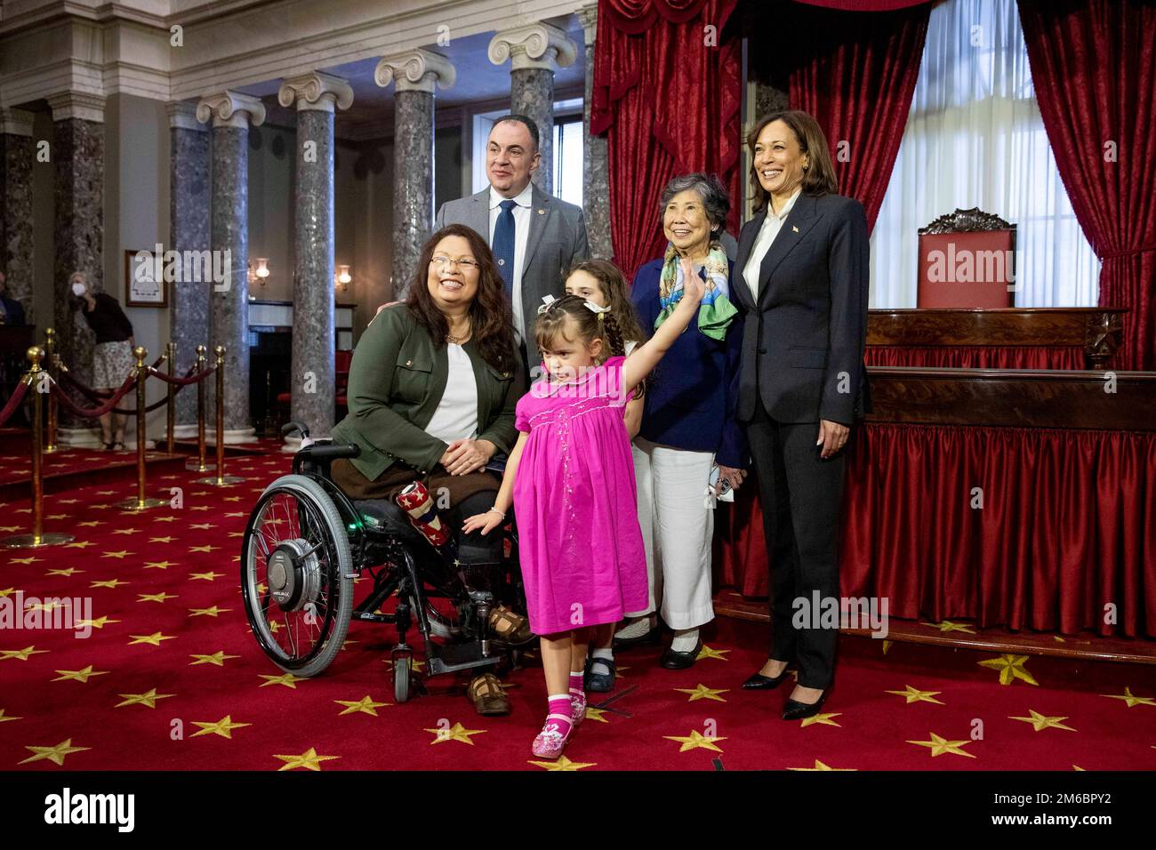 Sen. Tammy Duckworth, D-IL, and her husband Bryan Bowlsbey, mother ...