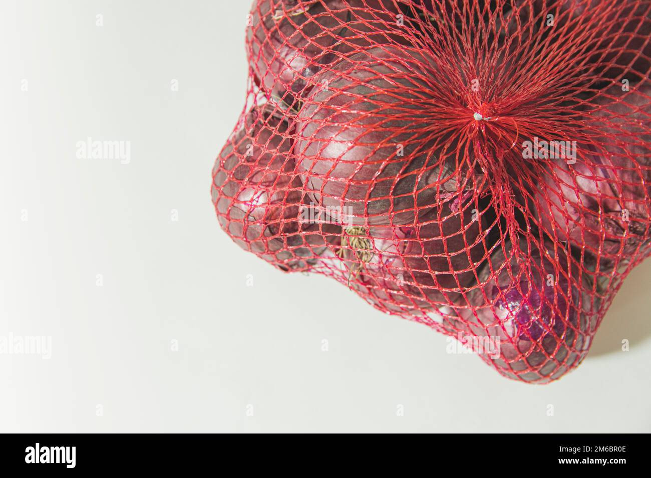 Red onion on a white background in a grid - natural 02 Stock Photo - Alamy