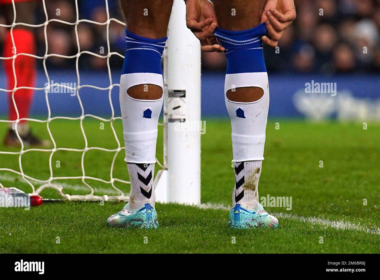 Detail of holes cut into the back of the socks of Everton's Dominic ...