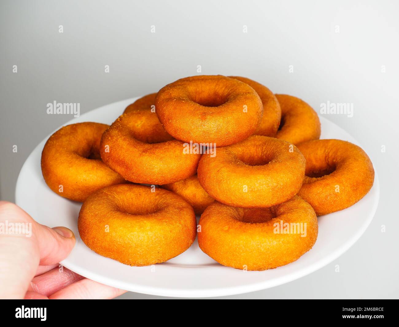 Person holding snack hi-res stock photography and images - Alamy