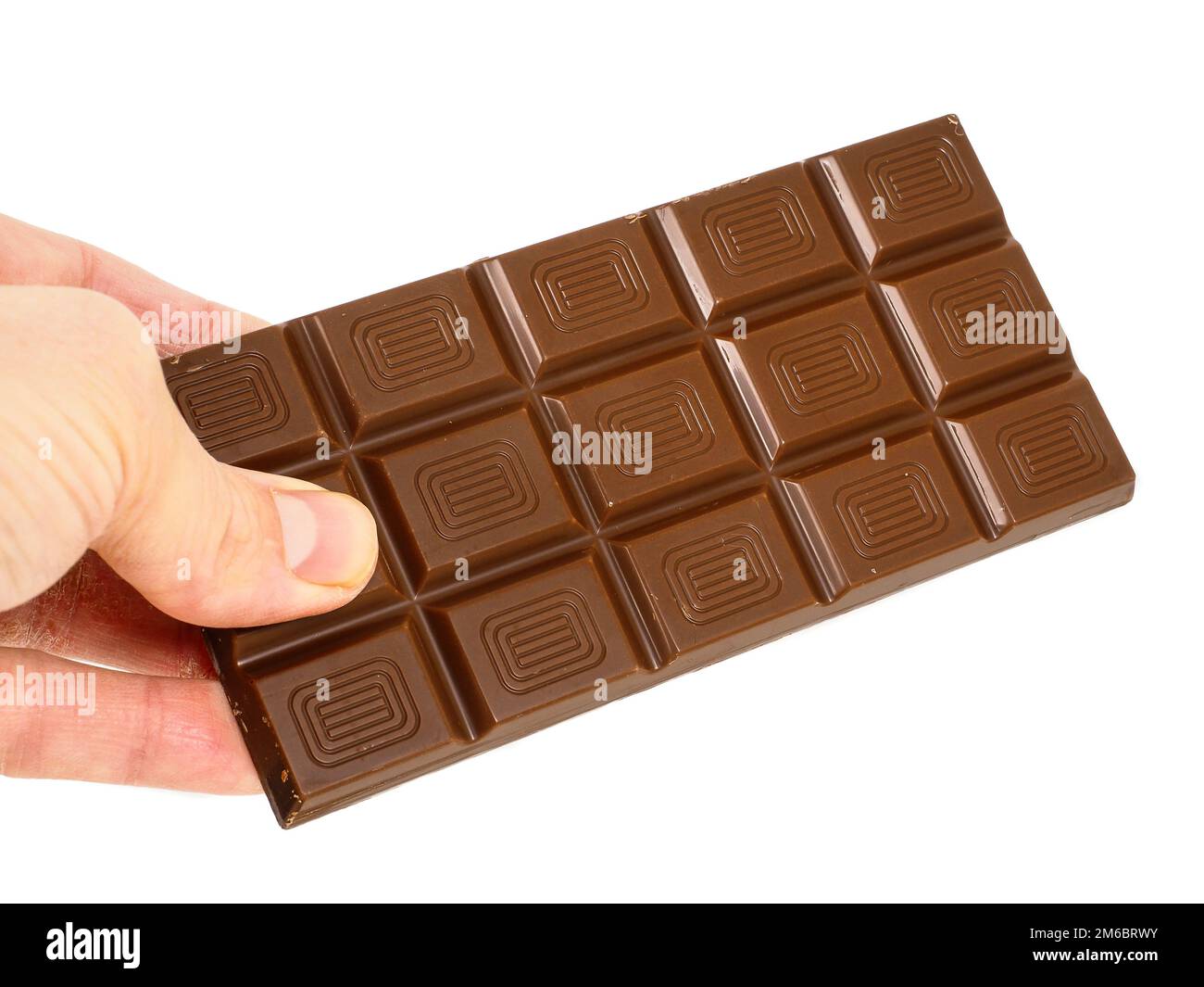 Person holding a whole bar of light chocolate isolated towards white ...