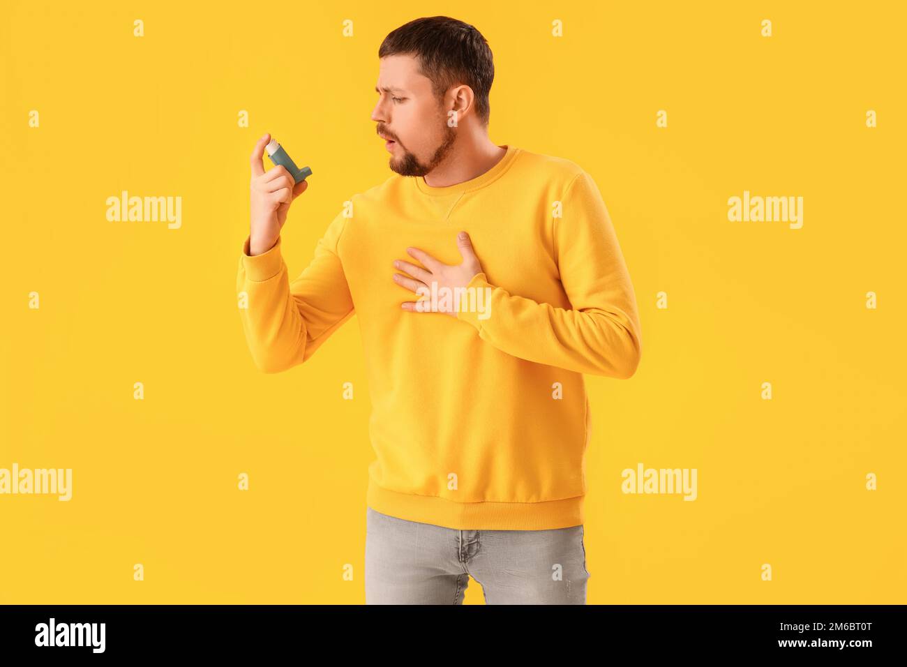 Sick man in yellow hi-res stock photography and images - Alamy