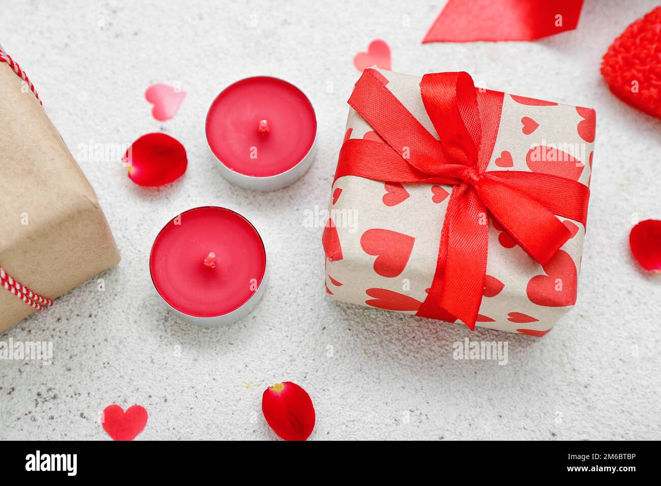 Gifts with candles and hearts on white background. Valentine's Day ...