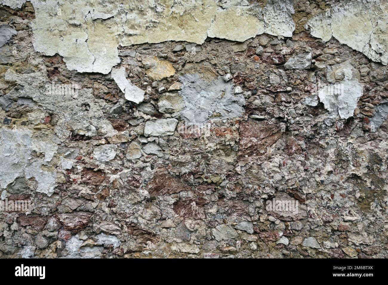 Close up view of crumbling plaster brick wall Stock Photo - Alamy