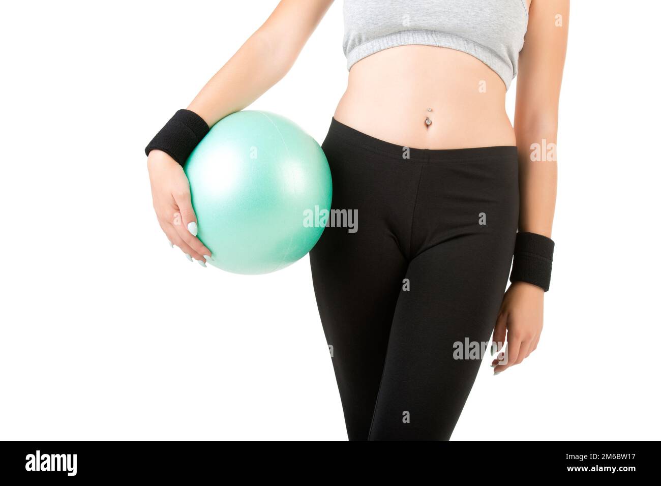 Woman Holding Pilates Ball Stock Photo - Alamy