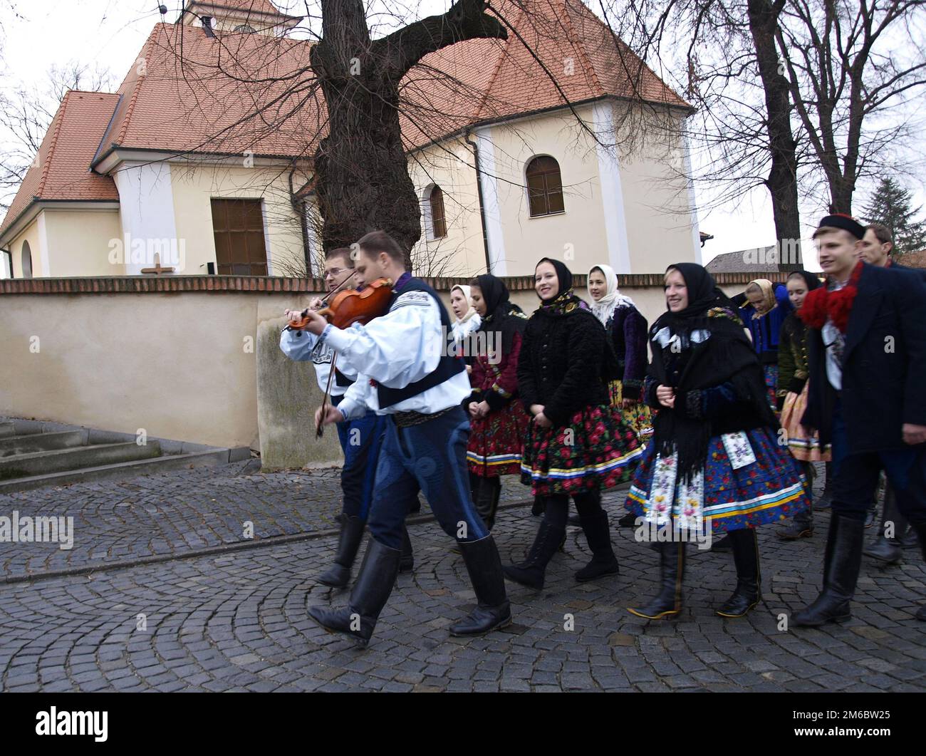 Musicians parade village - folklore Stock Photo - Alamy
