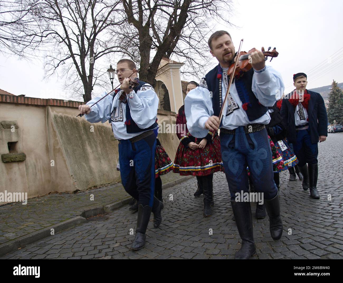 Musicians parade village - folklore Stock Photo - Alamy