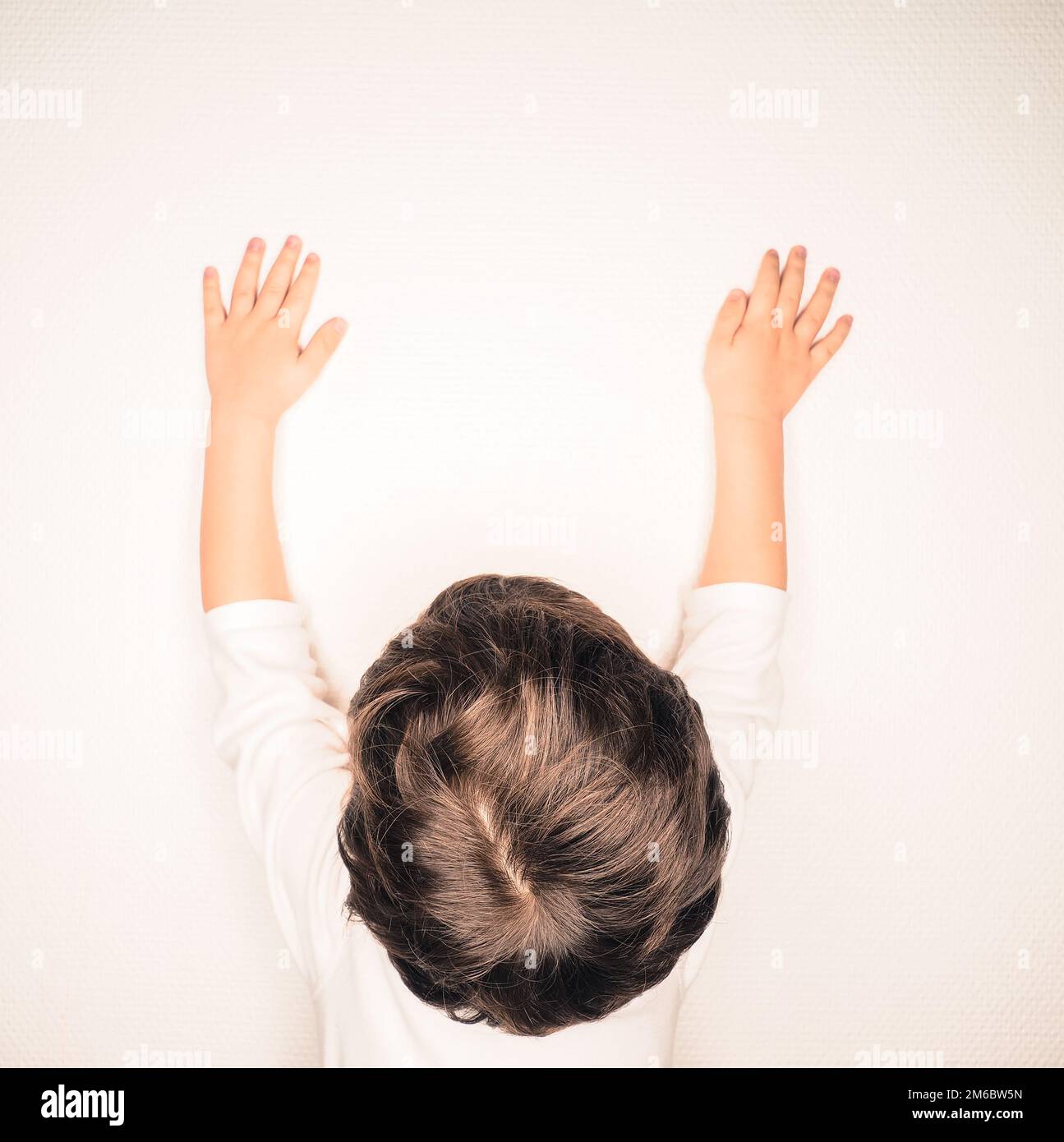 Closeup of beautiful brown hair on unrecognizable boy Stock Photo - Alamy
