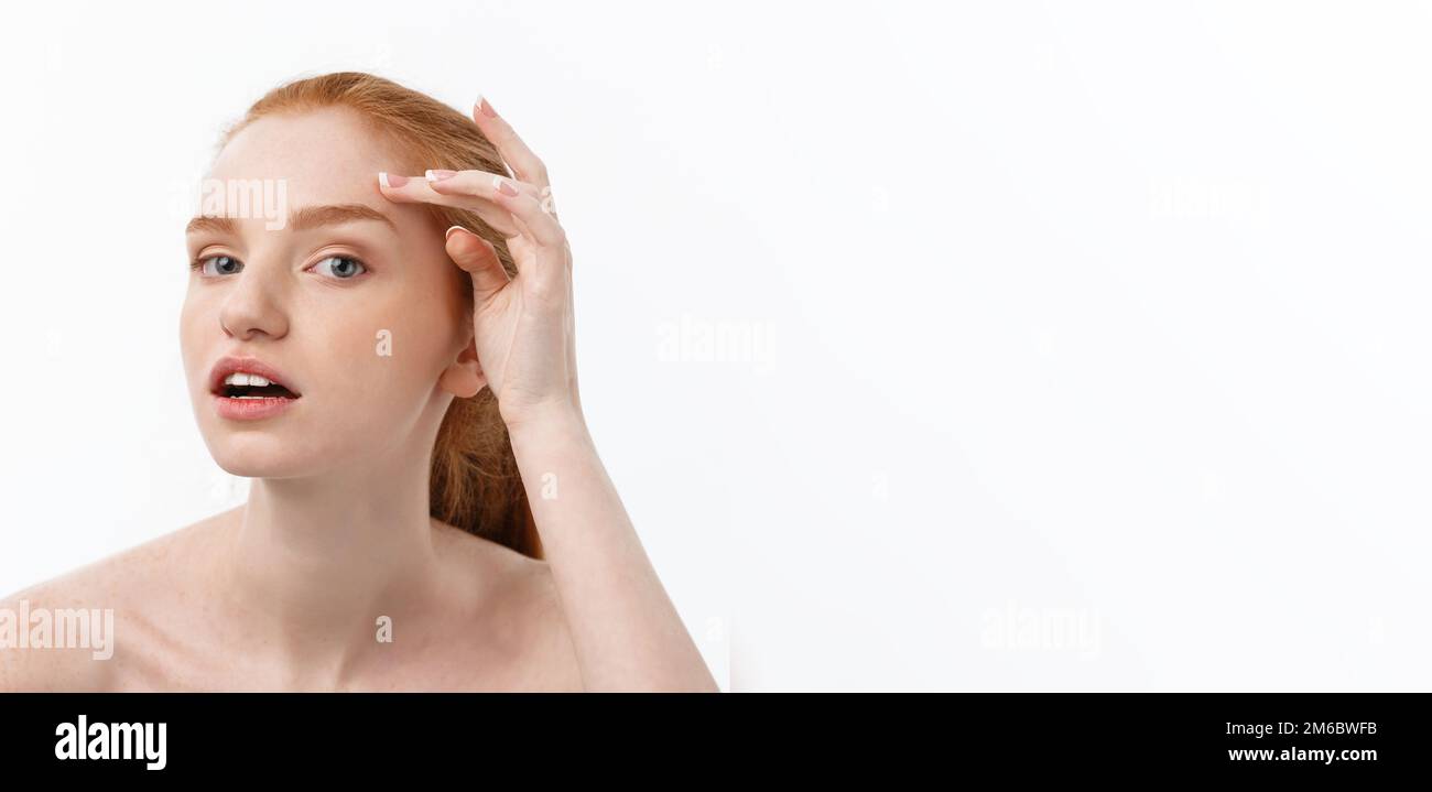 redheaded woman shows fingers on acne on her face Stock Photo - Alamy