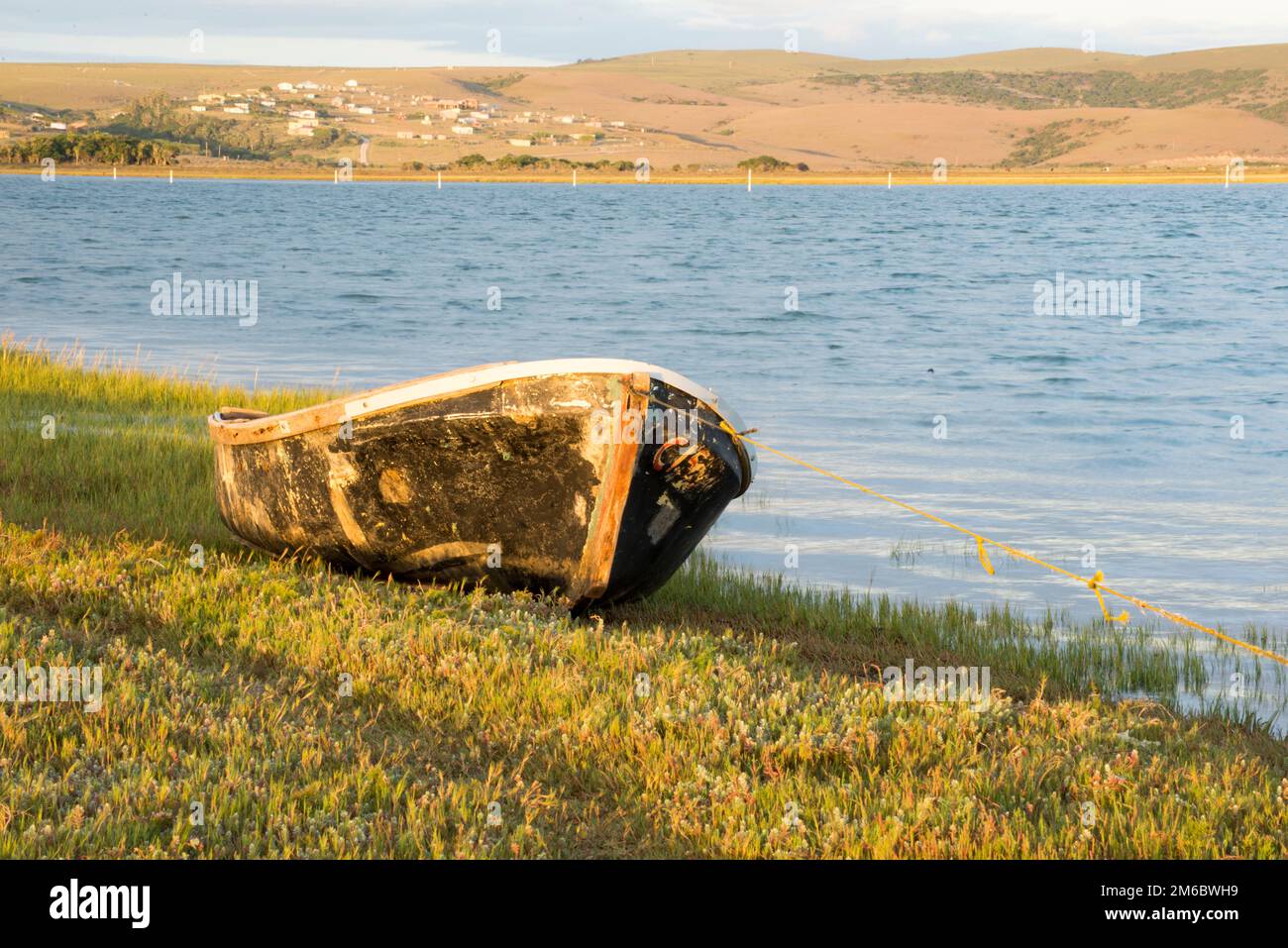 Old Hull of Ski Boat on River Bank Stock Photo - Alamy