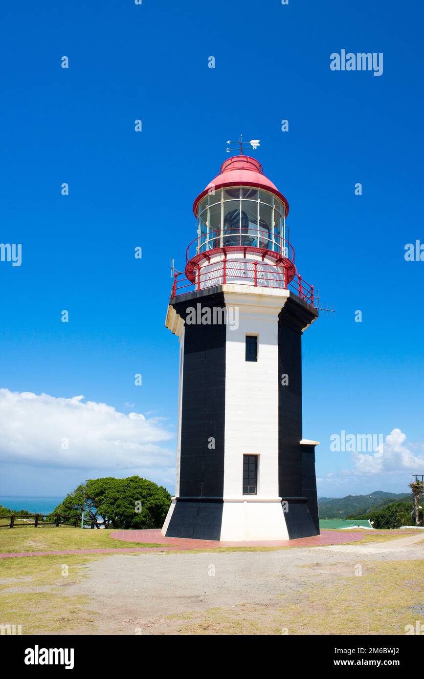 Blue and White Lighthouse with Red Light Stock Photo - Alamy