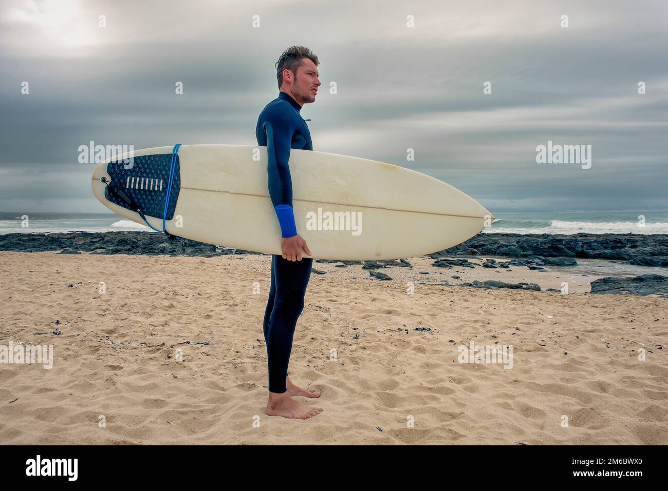 Side Portrait of Surfer Stock Photo - Alamy