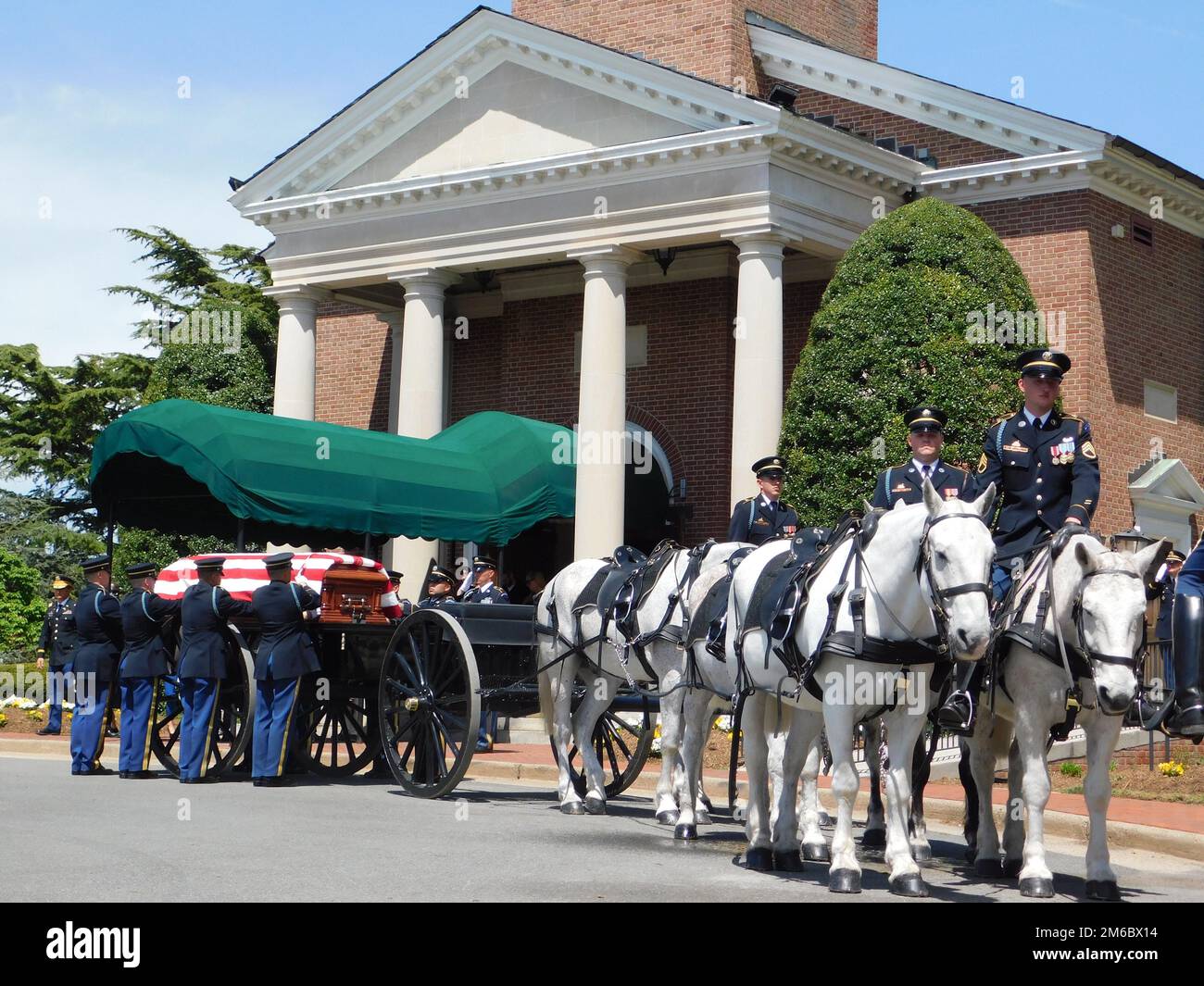 The Army Honor Guard escorts the casket of Army Sgt. Elwood M. Truslow ...