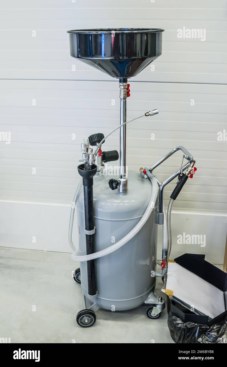 The capacity to collect used oil from the car engine Stock Photo - Alamy