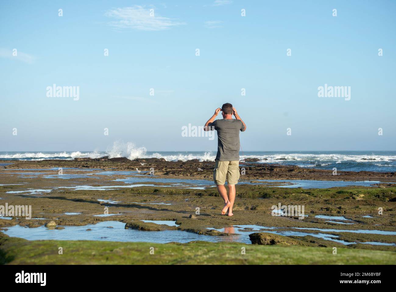 Man walking on low tide hi-res stock photography and images - Alamy