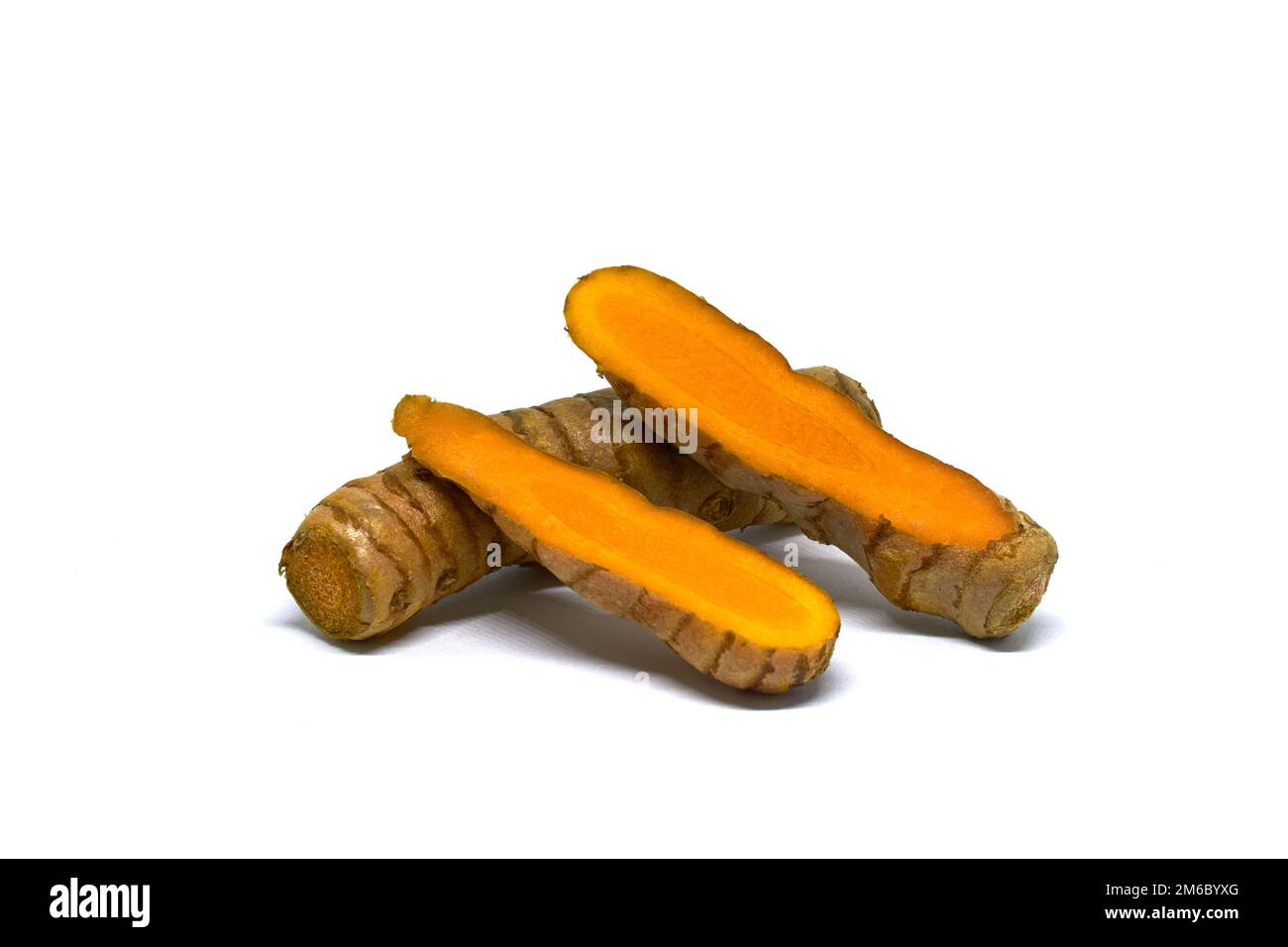 Fresh Cut curcuma root isolated Stock Photo - Alamy