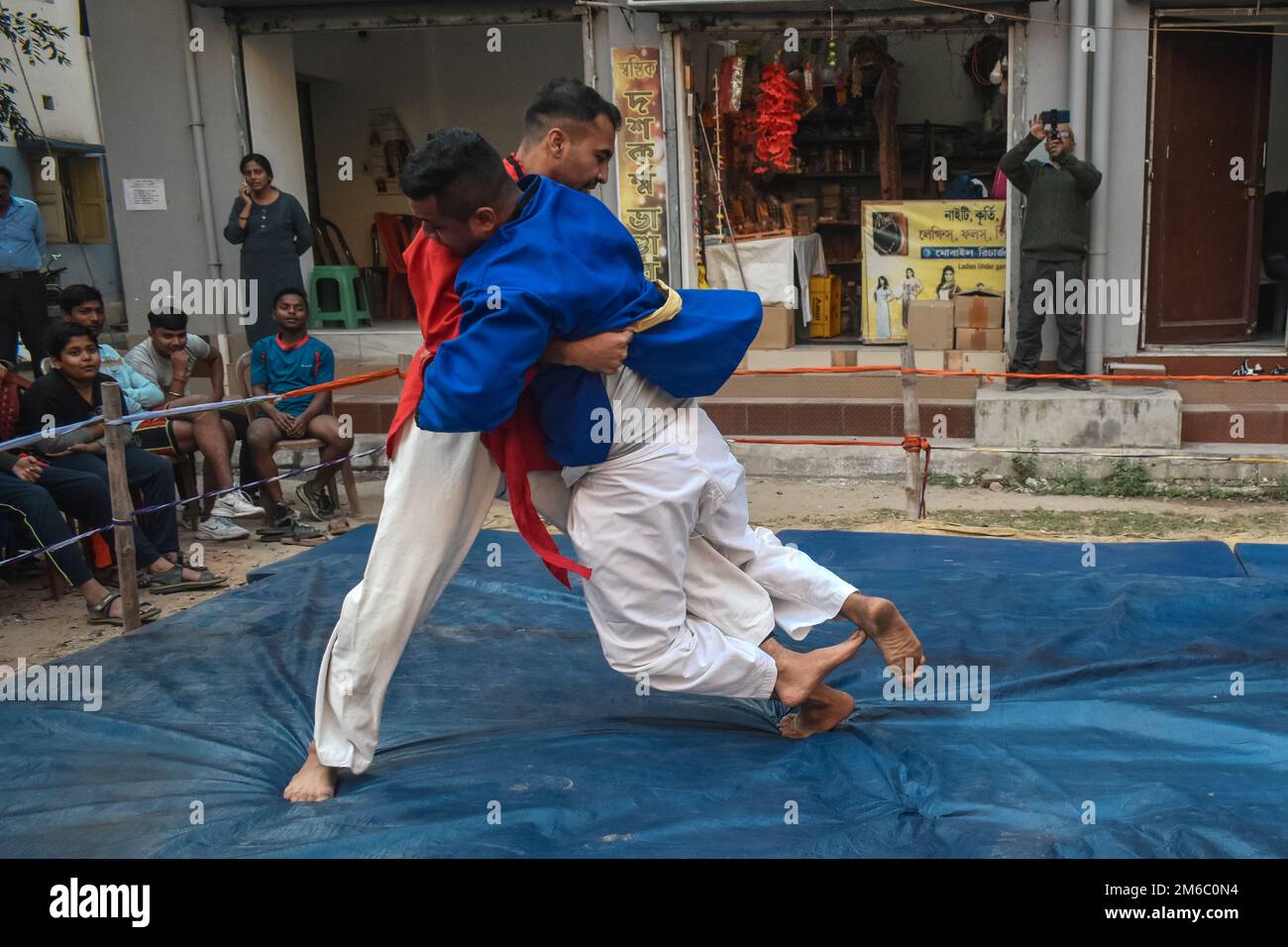 Kolkata, India. 03rd Jan, 2023. Wrestlers fight during an amateur ...