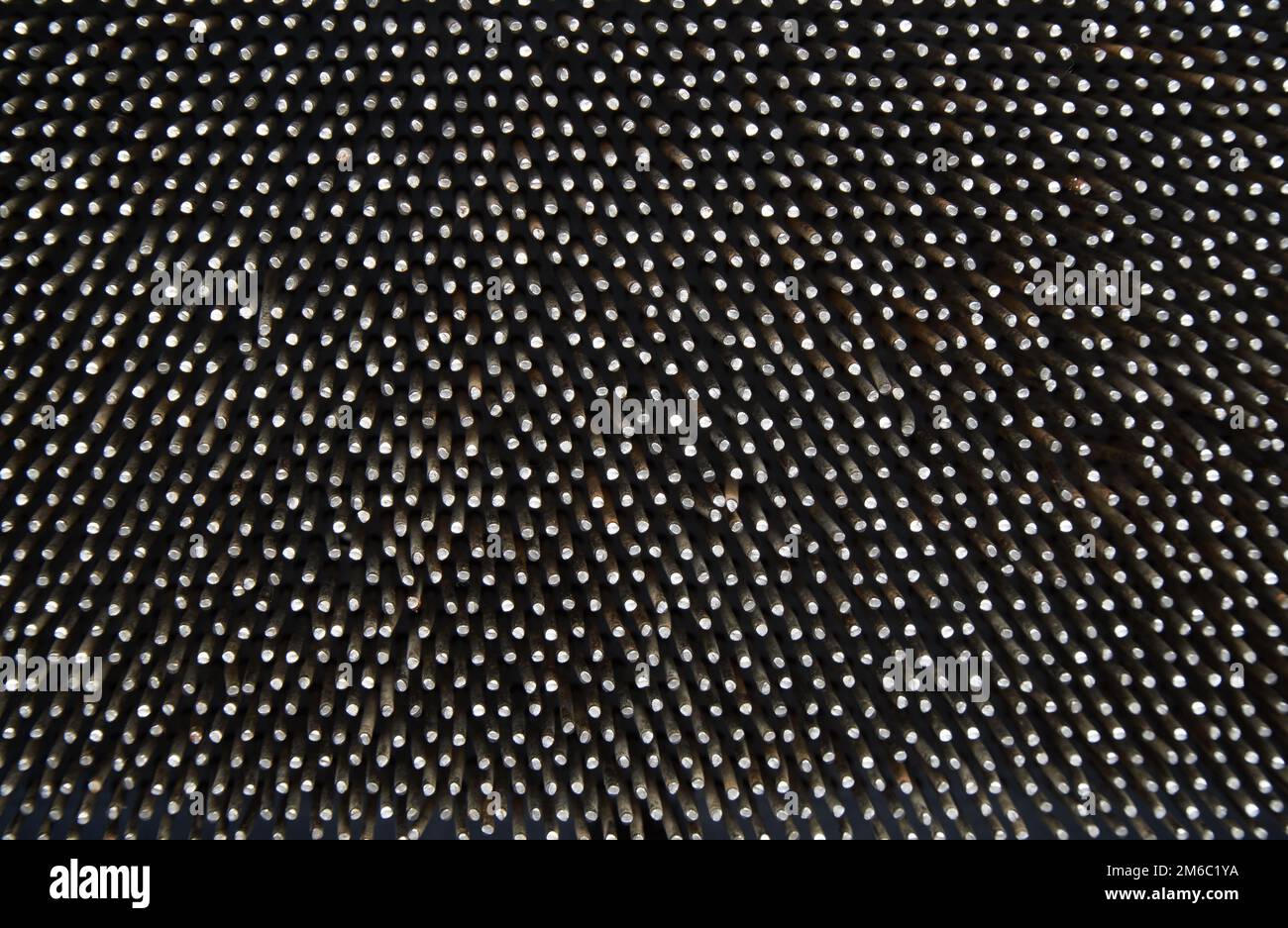 Dark worn rusty metal nails texture background Stock Photo - Alamy