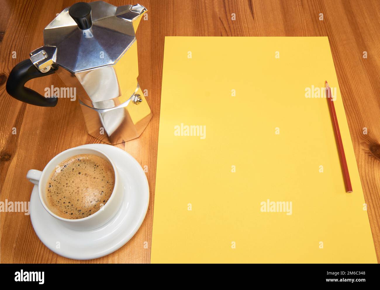 Creativity concept with coffee, espresso cooker and a blank sheet of ...