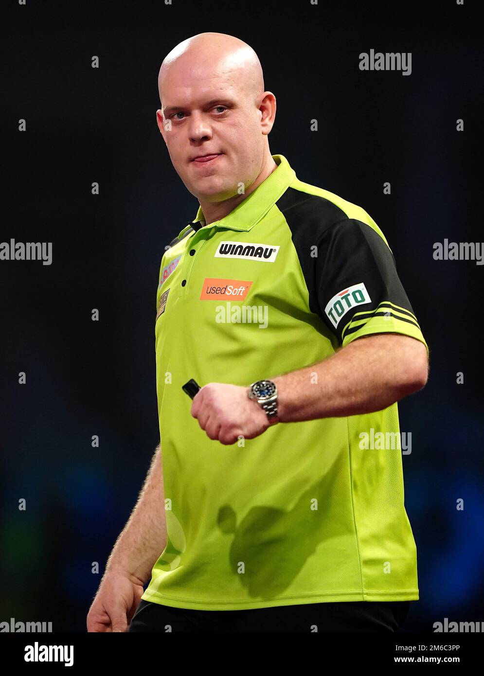 Michael van Gerwen in action during the final of the Cazoo World Darts ...