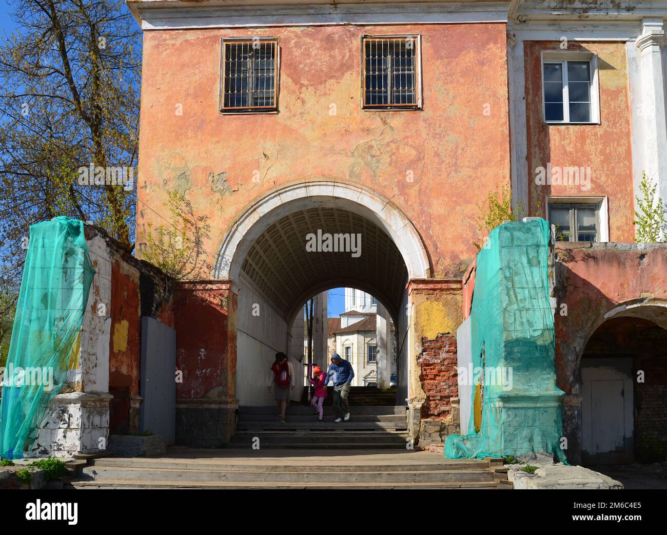 Tver, Russia - may 07.2017. Family walks through the arch in building of the old river terminal ...