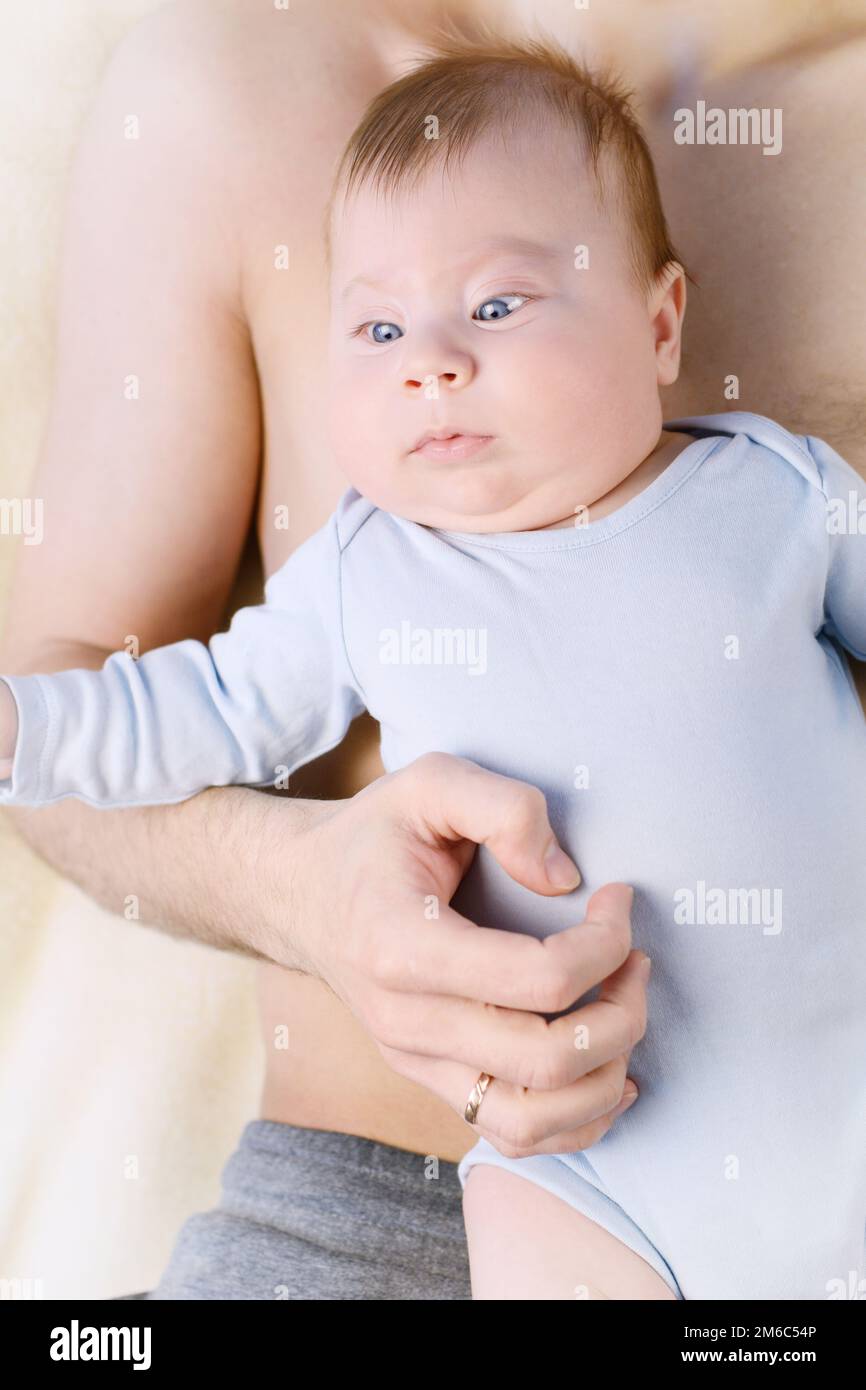Father is playing with his baby Stock Photo - Alamy