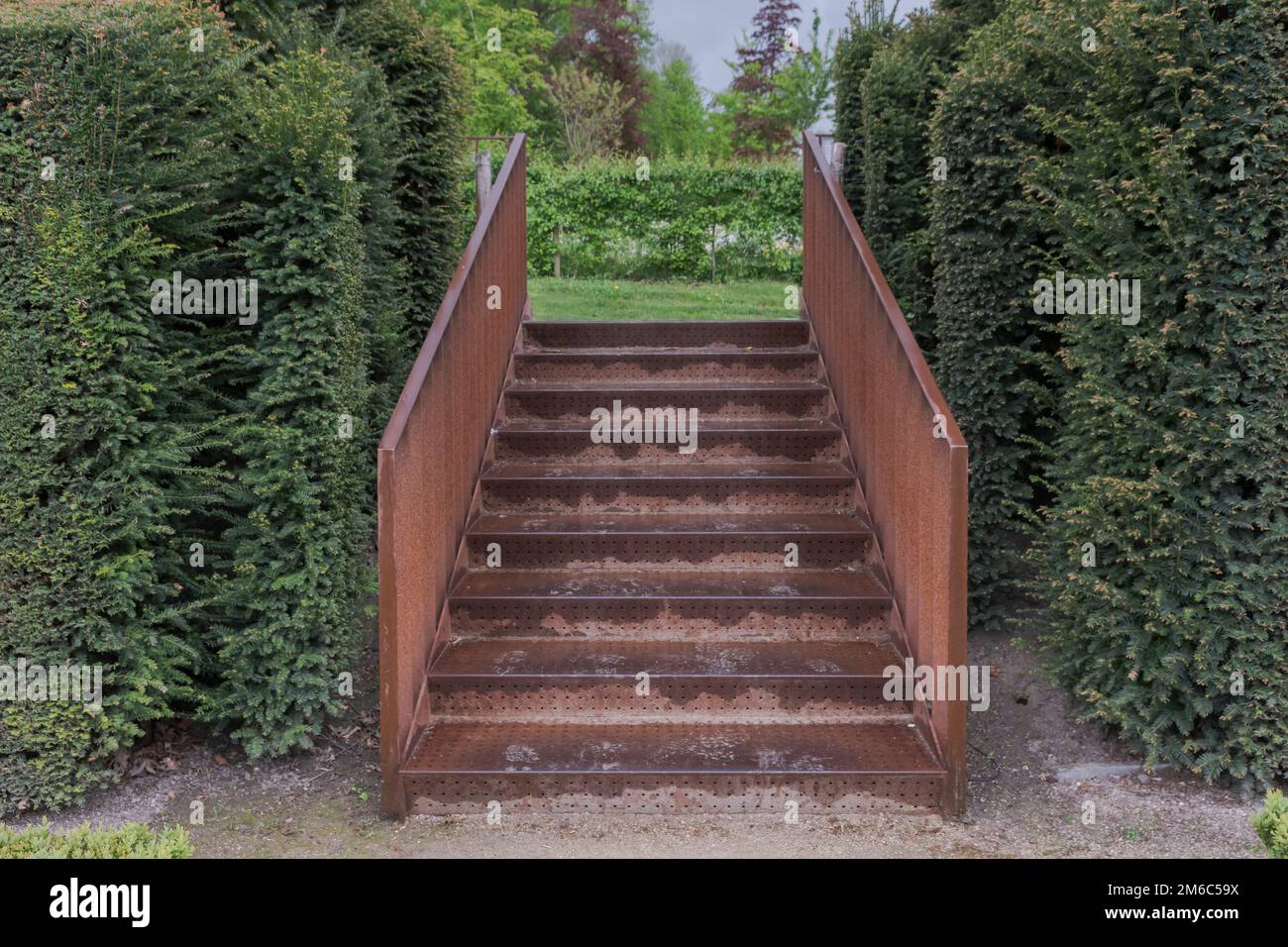 Iron rusty stairs in the park wet from the rain Stock Photo - Alamy